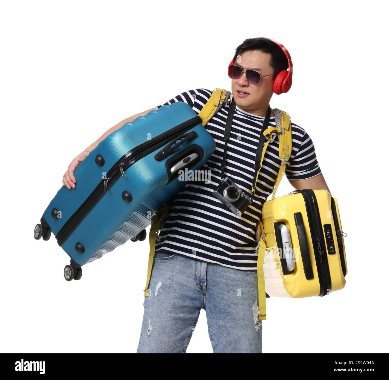 Traveller carrying heavy suitcases on white background Stock Photo - Alamy