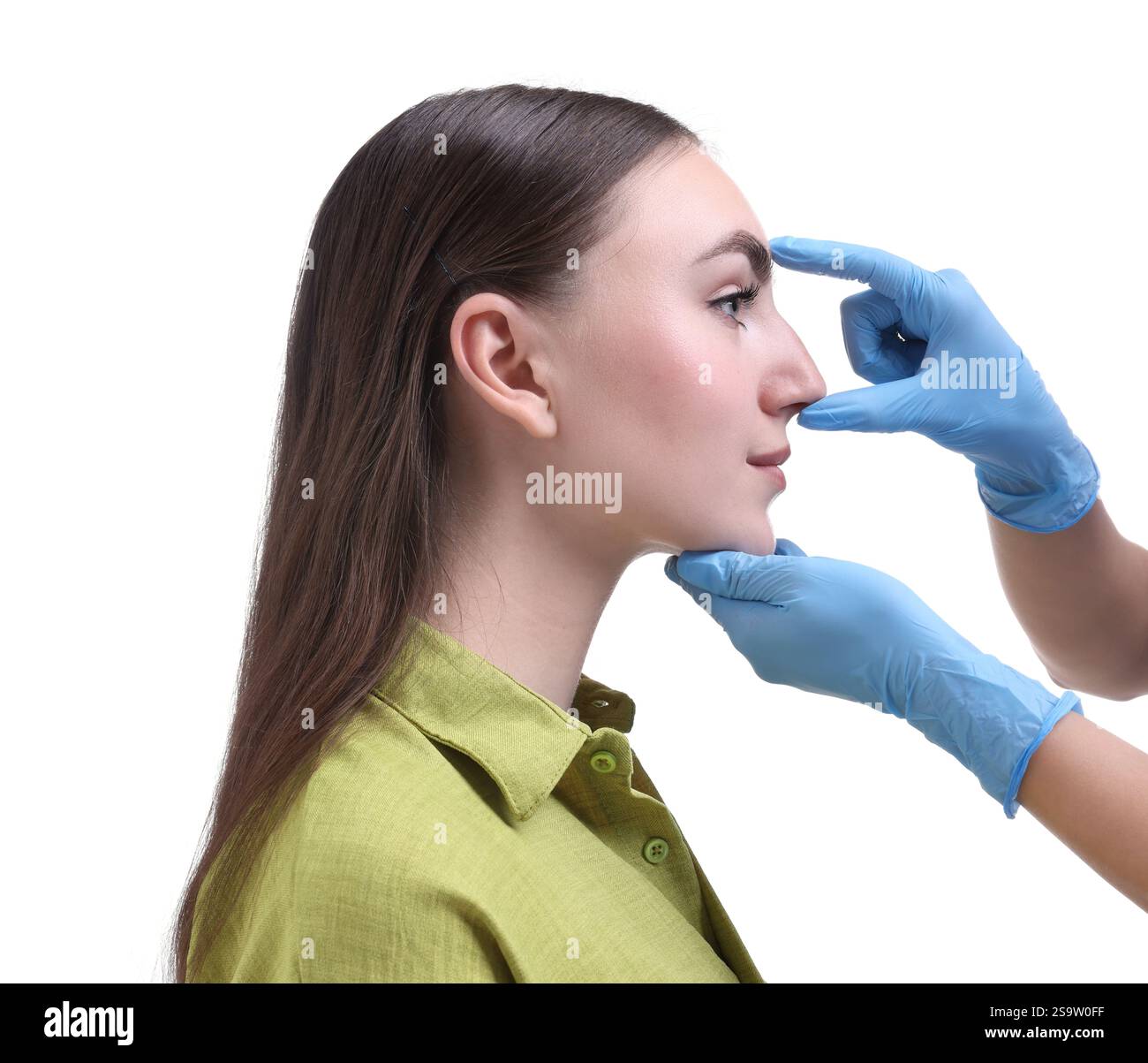 Doctor checking patient's nose before plastic surgery operation on ...