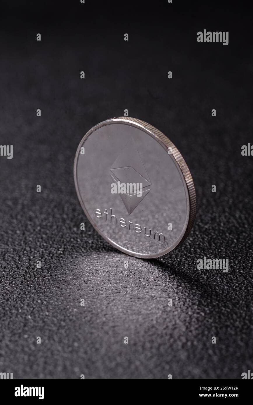 Ethereum cryptocurrency dummy in the form of a round iron coin ...