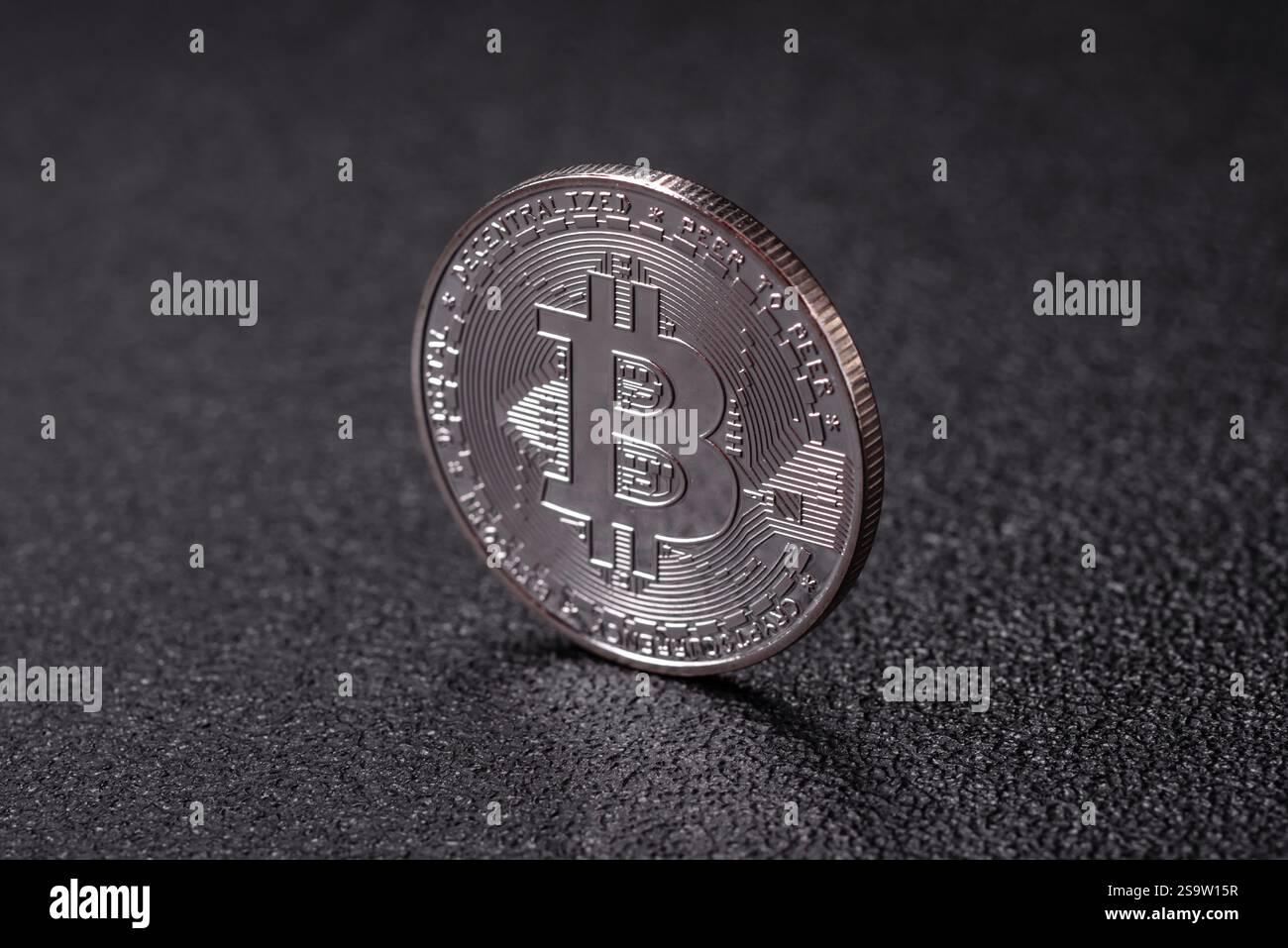 Bitcoin cryptocurrency dummy in the form of a round iron coin ...