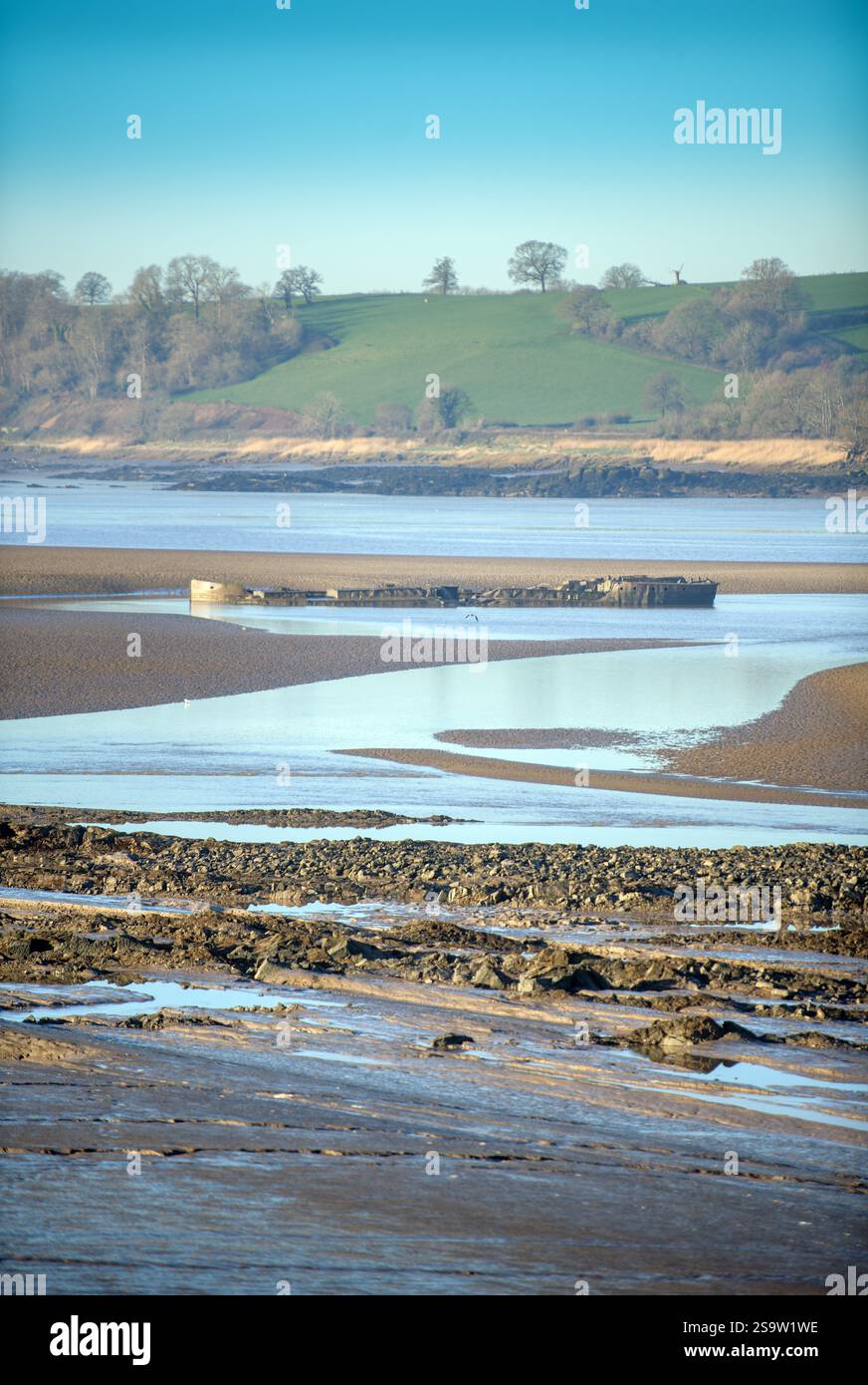 Low tide in the Severn Estuary reveals the wrecks of the two barges ...