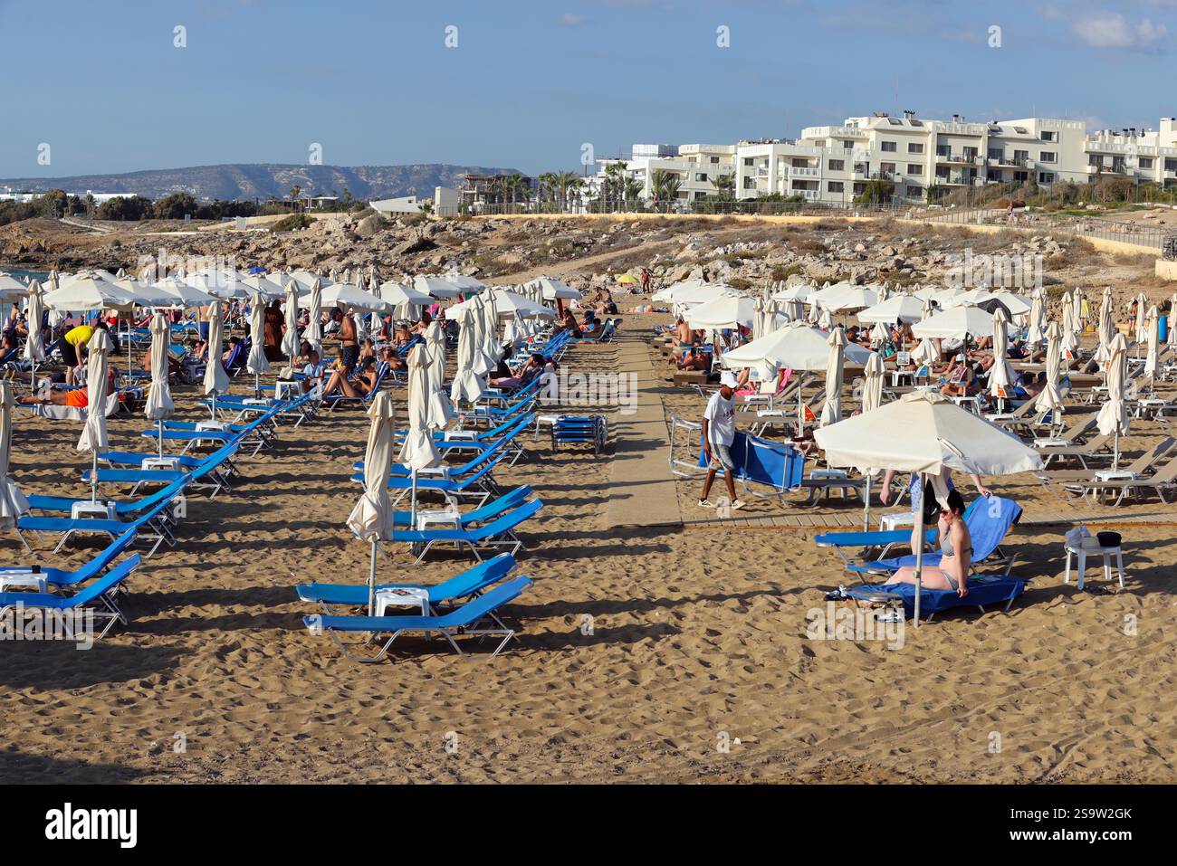 Early Evening sunshine lights the Venus beach in Paphos, cyprus. This ...