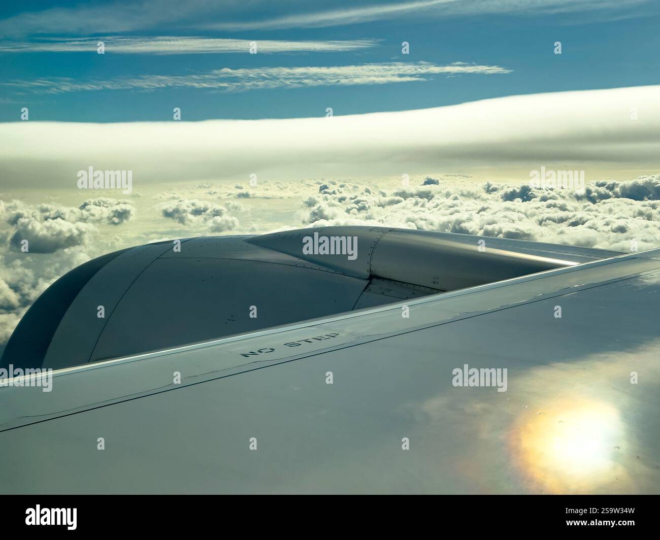 An airplane turbine over the Atlantic. The power of a commercial flight ...
