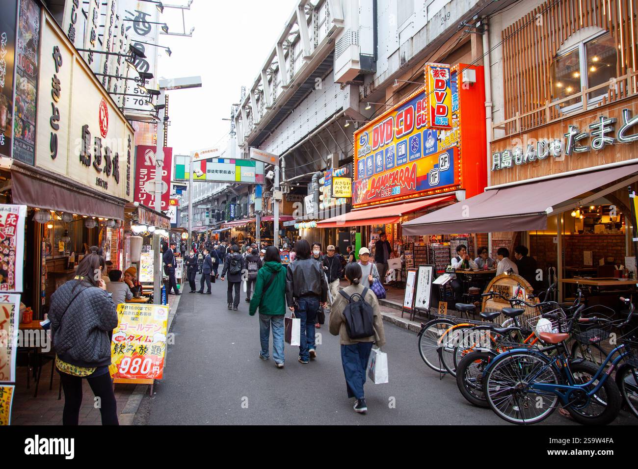 Shops and restaurants in the famous shopping district Ueno Ameyoko ...