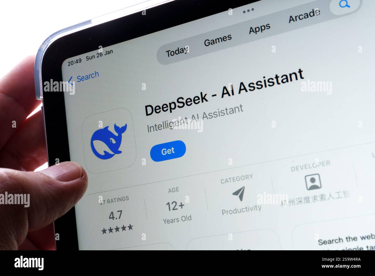 DeepSeek AI Assistant app seen in app store on the ipad and the finger ...
