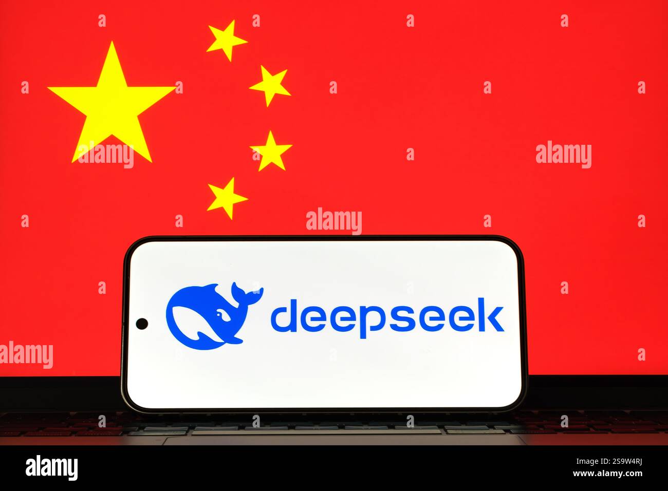DeepSeek AI company logo seen on the smartphone and blurred Chinese ...