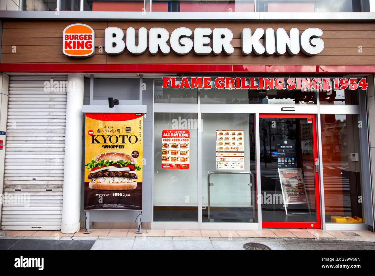 A Burger King fast food restaurant in Tokyo Japan with poster ...