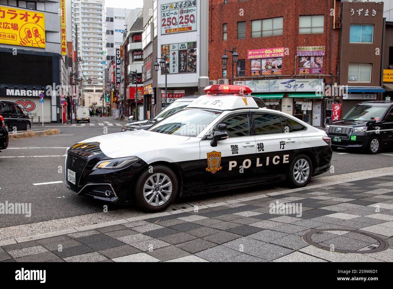 A Japanese police car parked outside Akabane station in Tokyo, Japan ...