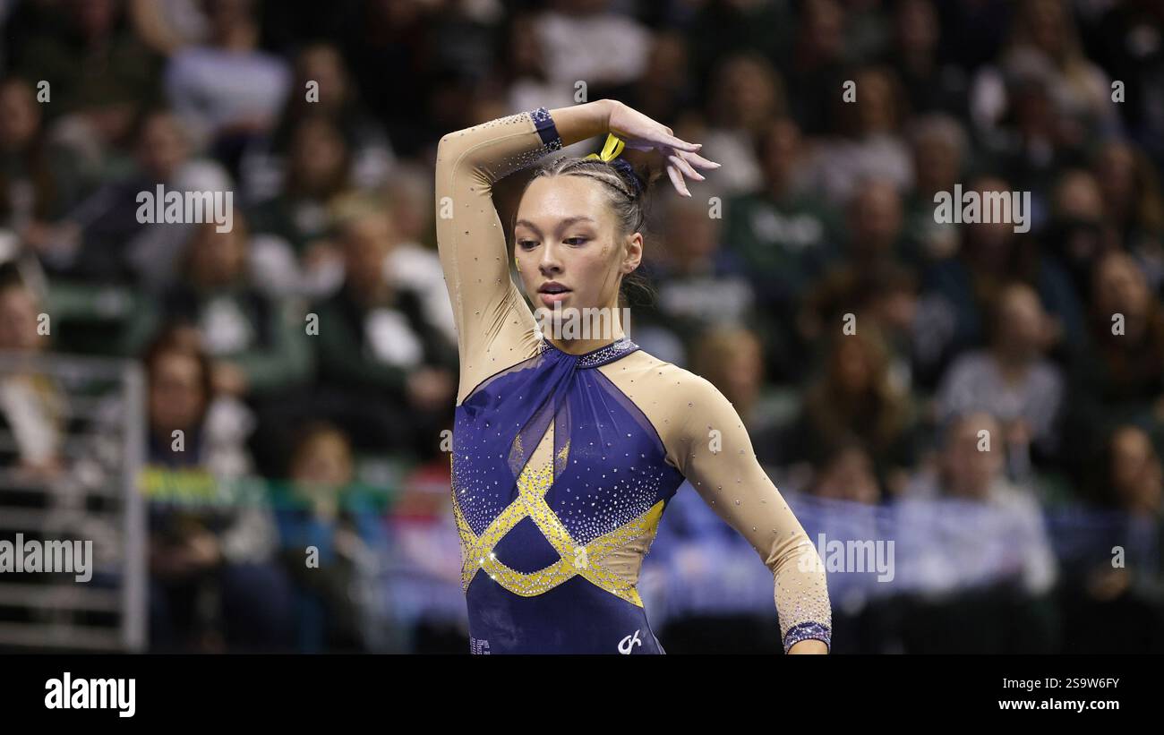 Michigan's Kayli Boozer competes during an NCAA gymnastics meet on ...