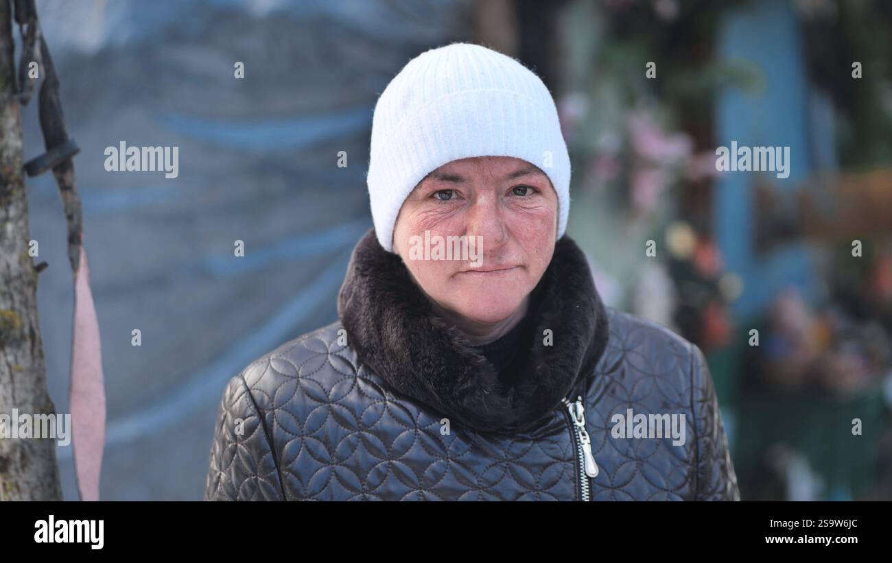 Portrait of a homeless woman struggling with alcohol addiction ...