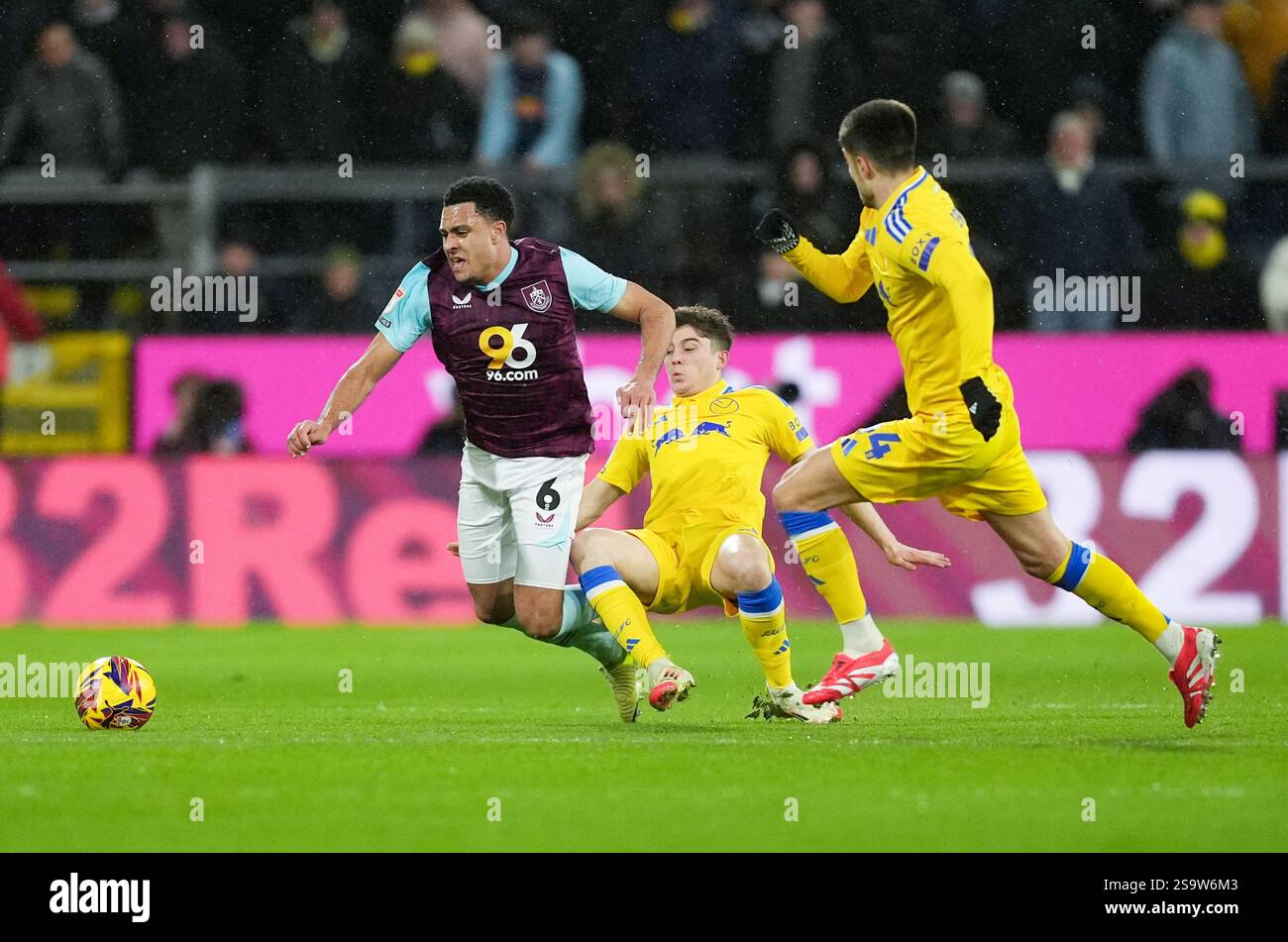 Burnley's CJ Egan-Riley is fouled by Leeds United's Daniel James during ...