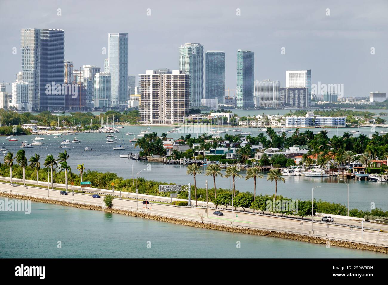 Miami Florida,MacArthur Causeway traffic,Palm Island,Biscayne Bay,boats ...