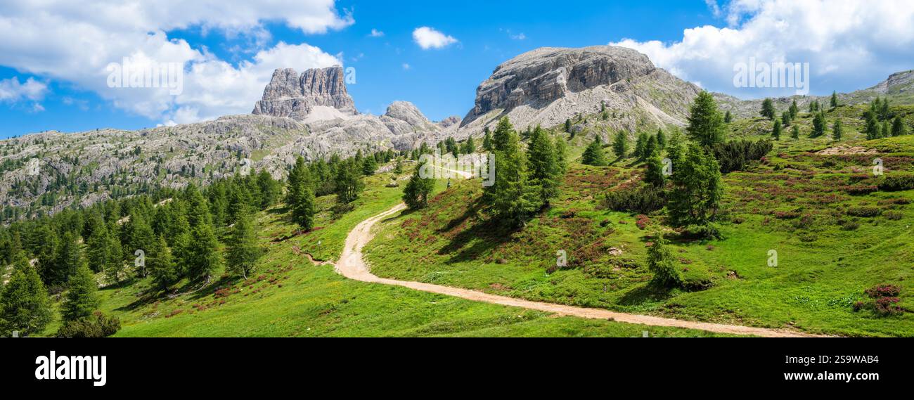 A picturesque hiking trail at Valparola mountain pass winds through ...