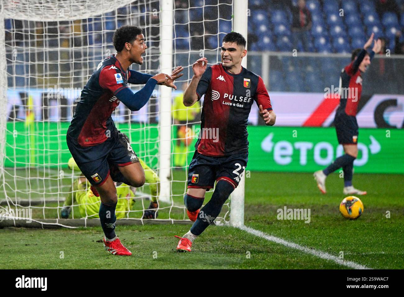Genoa's Koni De Winter, left, celebrates scoring during the Serie A ...