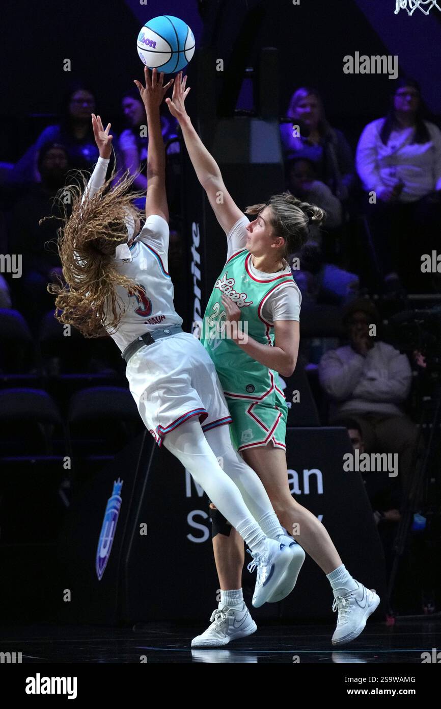 Laces guard Kate Martin (20) defends as Vinyl guard Jordin Canada (3 ...