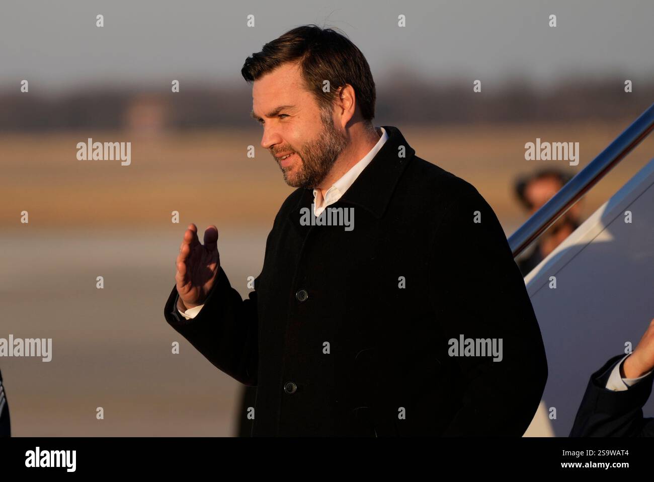 Vice President JD Vance salutes as he arrives on Air Force Two Monday ...