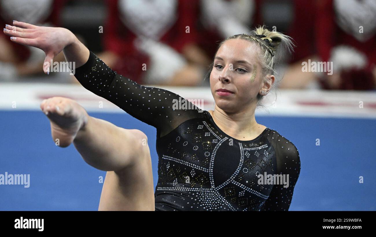 Denver gymnast Maddison Reidenbach competes on the floor during an NCAA ...