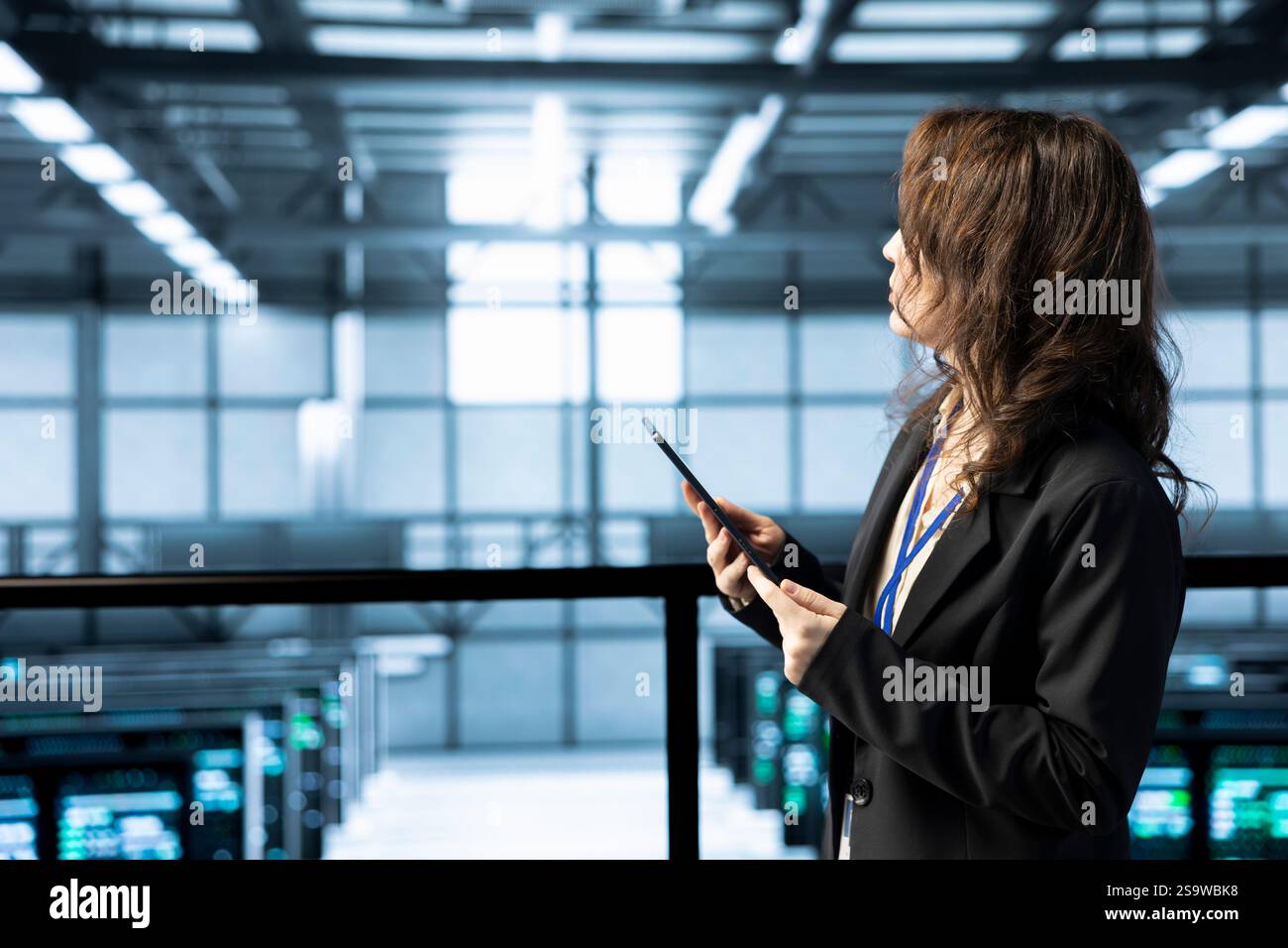 Programmer In Data Center Facility Uses Tablet Configuring Rigs Network Virtualization It