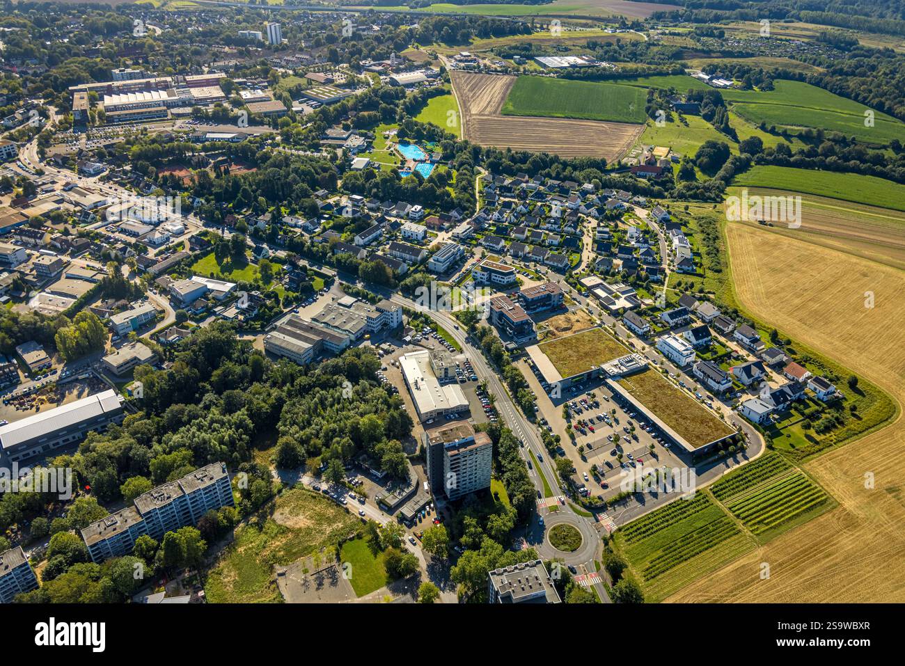 Aerial view, shopping center with supermarket Rewe and Aldi ...