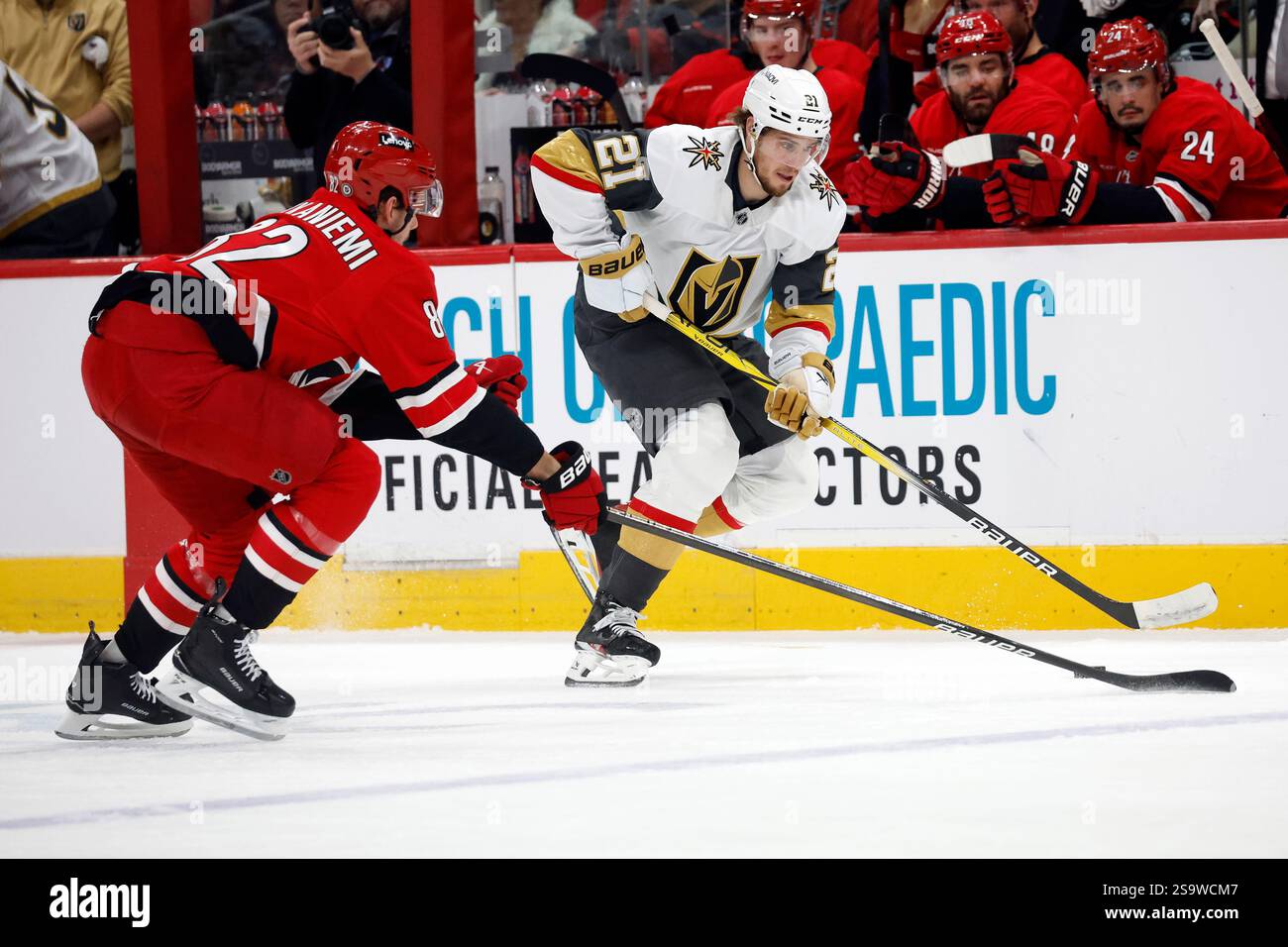 Vegas Golden Knights' Brett Howden (21) controls the puck near Carolina ...