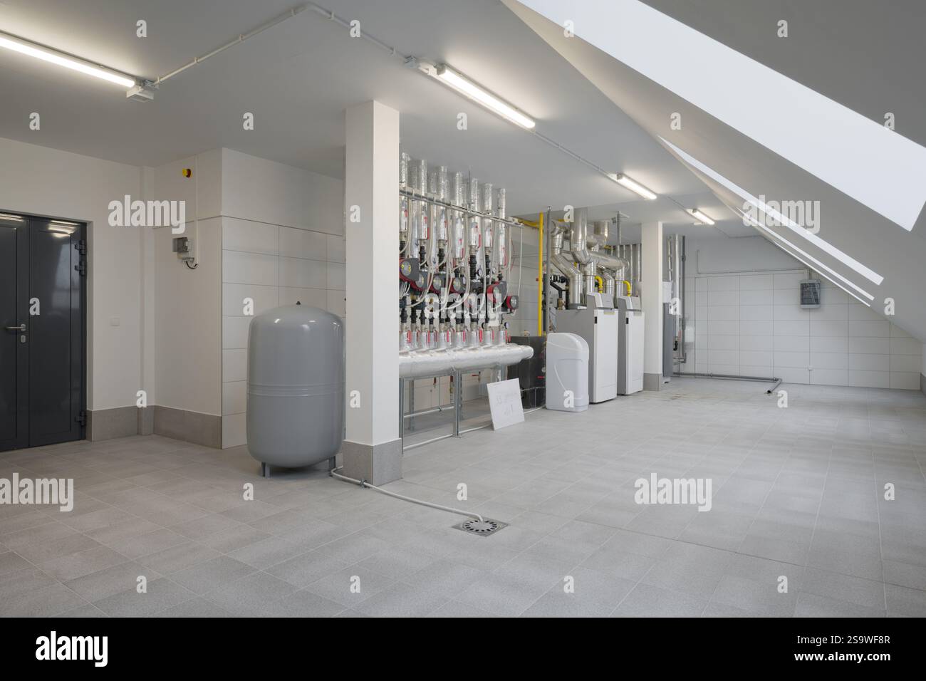 Mechanical Room with Heating Equipment and Pipes Stock Photo - Alamy