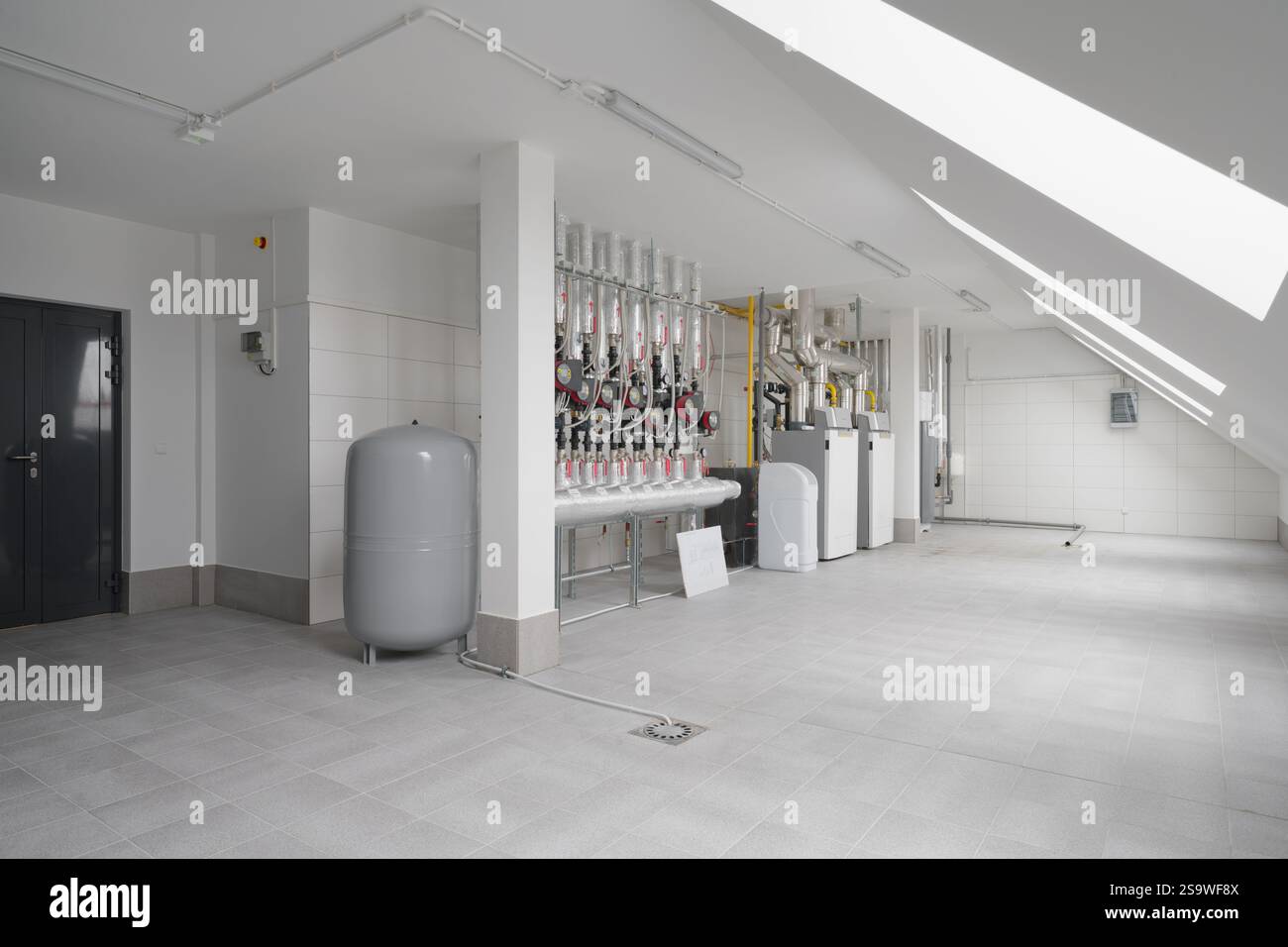 Mechanical Room with Heating Equipment and Pipes Stock Photo - Alamy