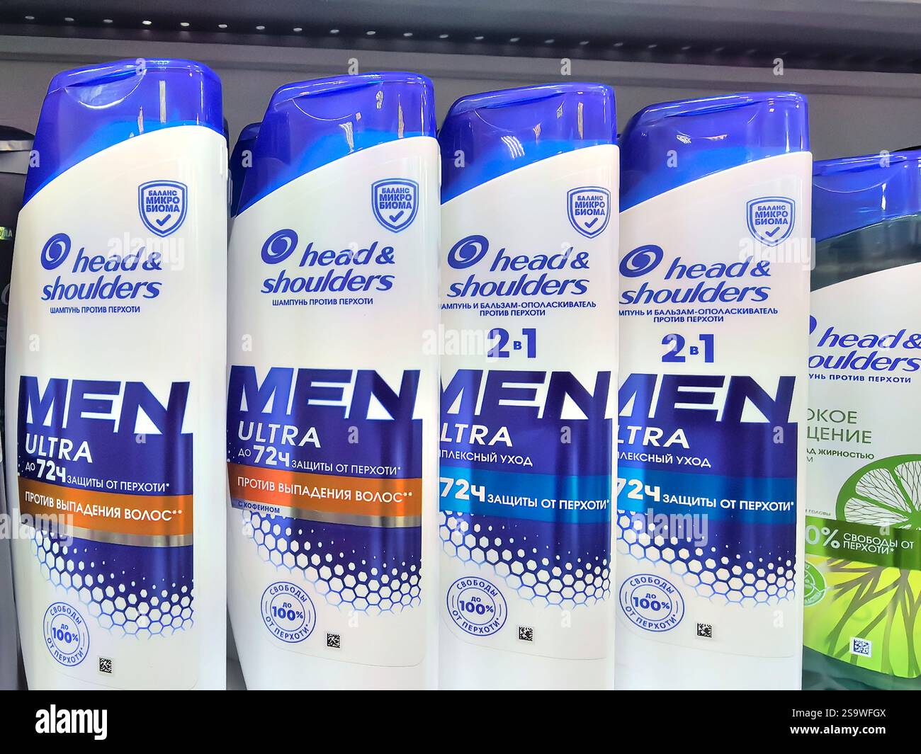 Bobruisk, Belarus - 26 January 2025: Shelves are lined with bottles of ...