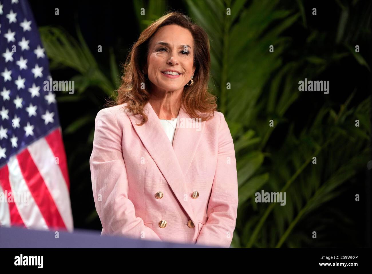 Rep. Lisa McClain, R-Mich., listens as President Donald Trump speaks at ...