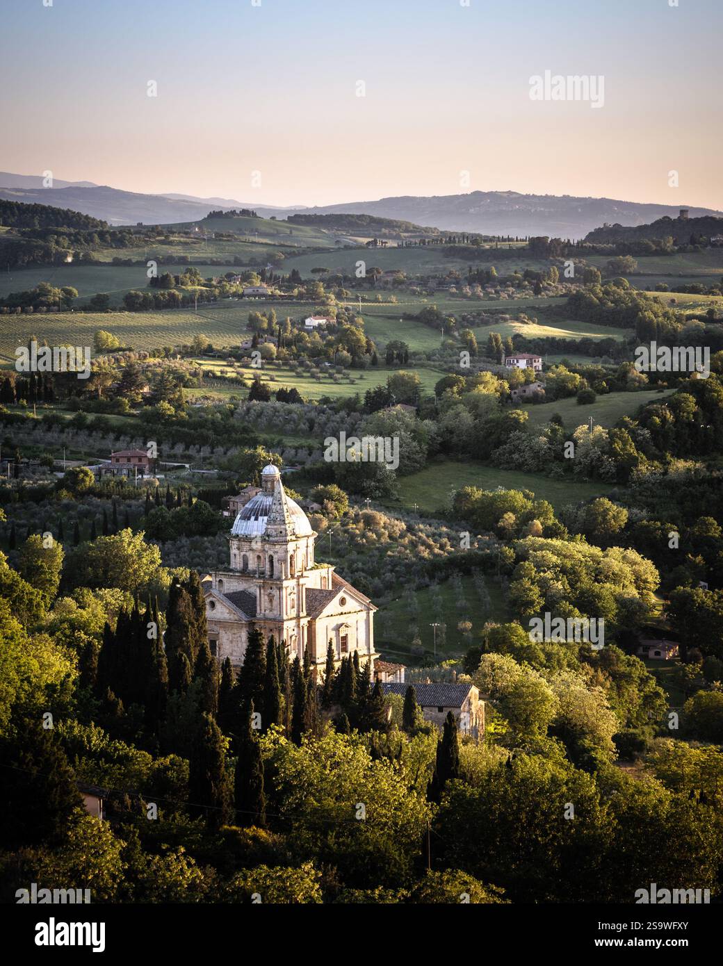 Rural Landscape with a Church and Rolling Hills in Tuscany Stock Photo ...
