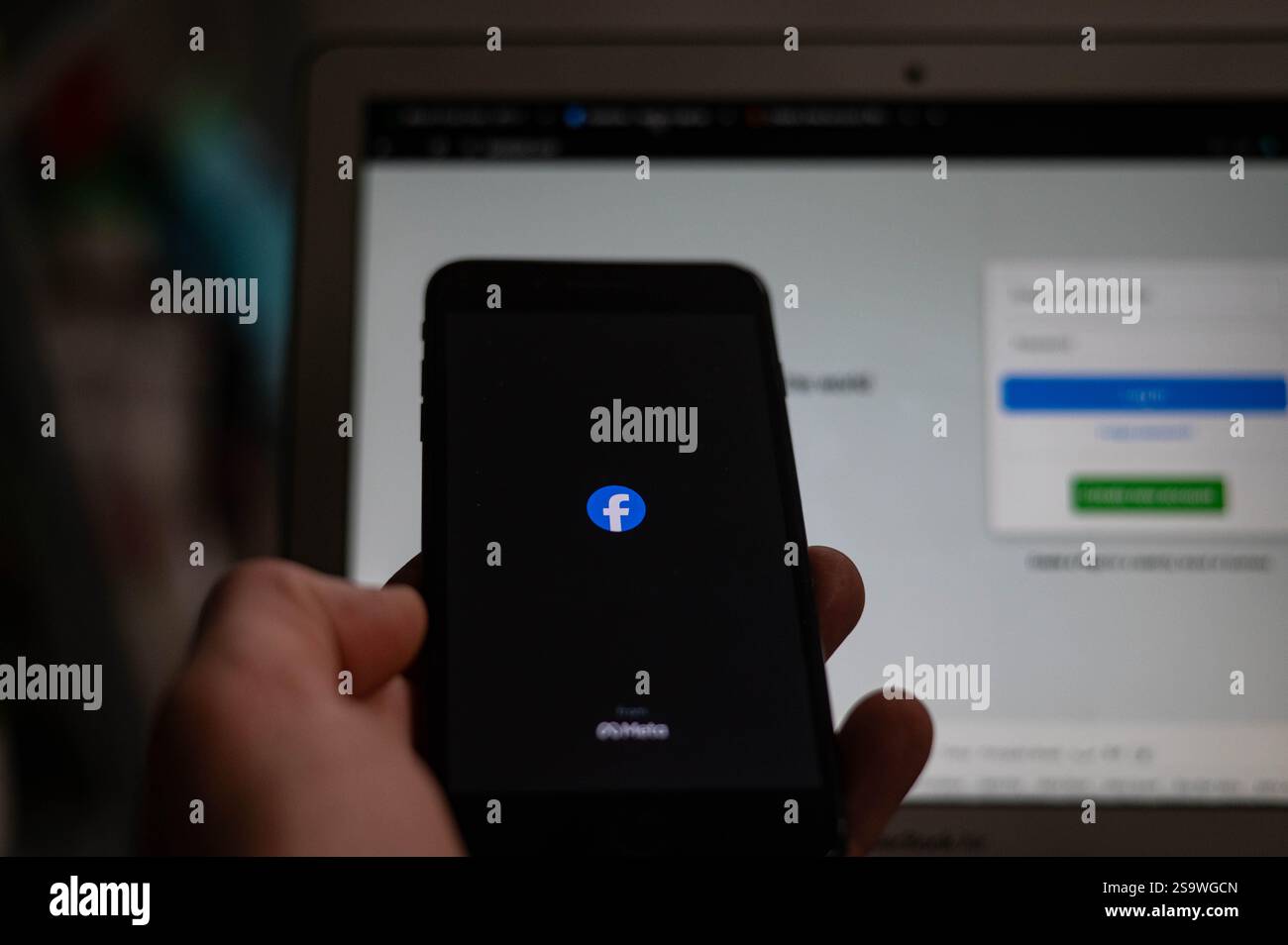A person is opening Facebook app on a phone. Facebook social media app ...
