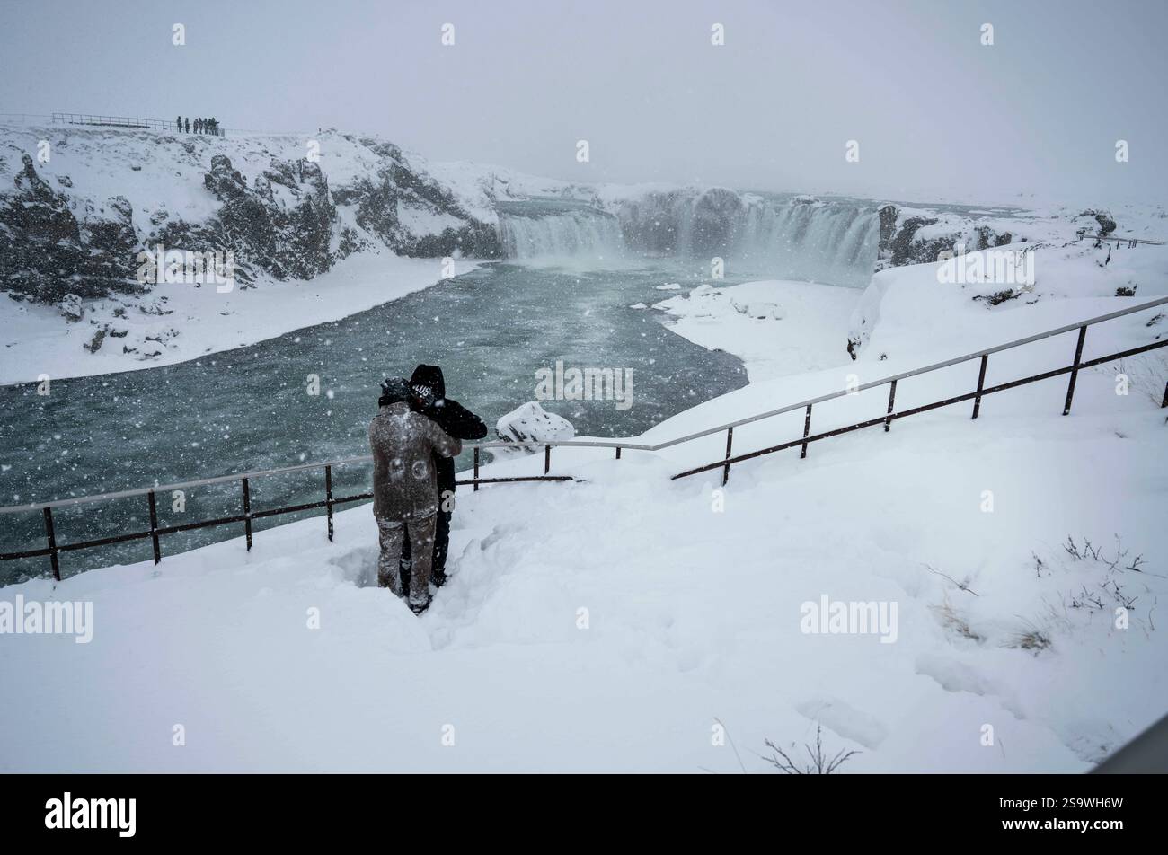 Akureyri, Iceland. 10th Jan, 2025. Two people are seen standing close ...