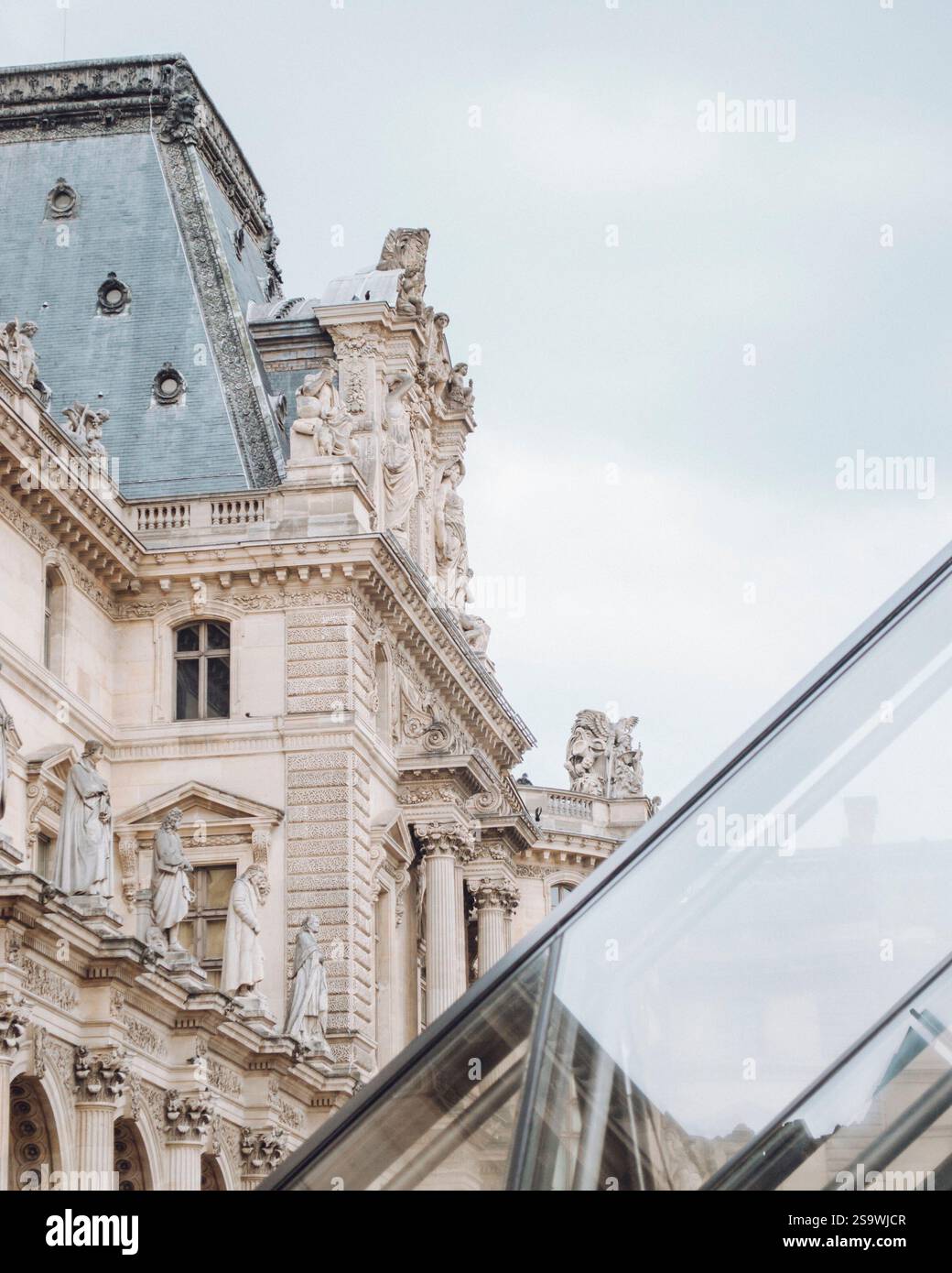 Iconic photograph of the Louvre Museum in Paris, showcasing its famous ...