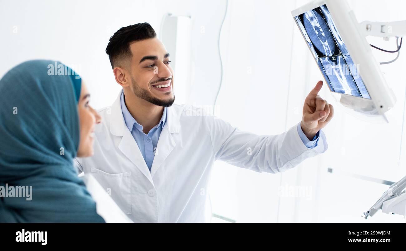 Female stomatologist showing digital hi-res stock photography and ...