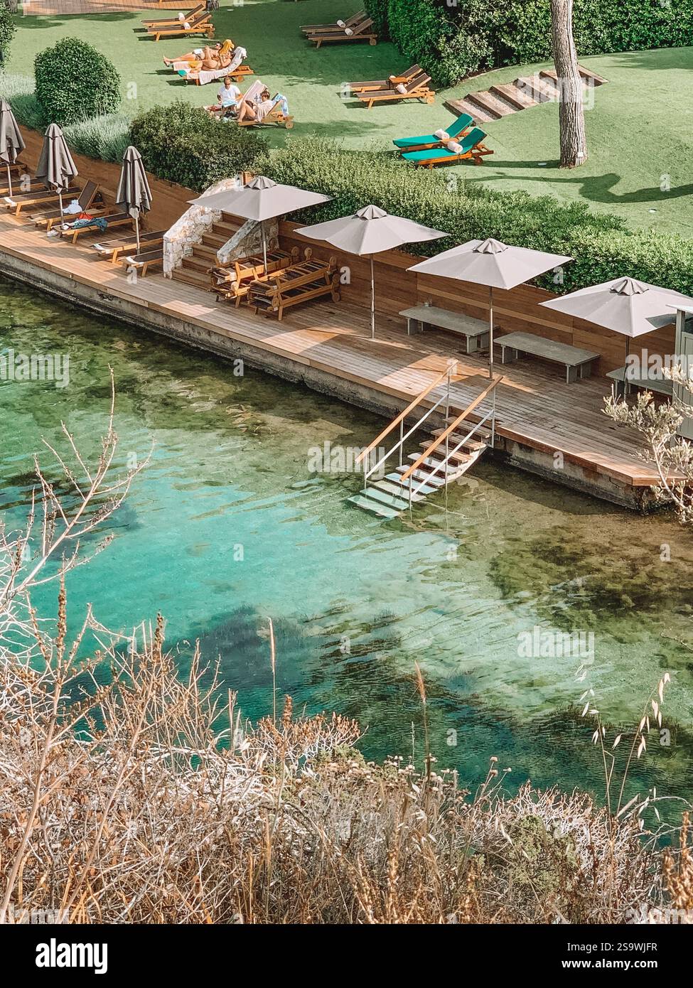 A beautiful photo of a beach club in Athens, Greece, featuring wooden ...