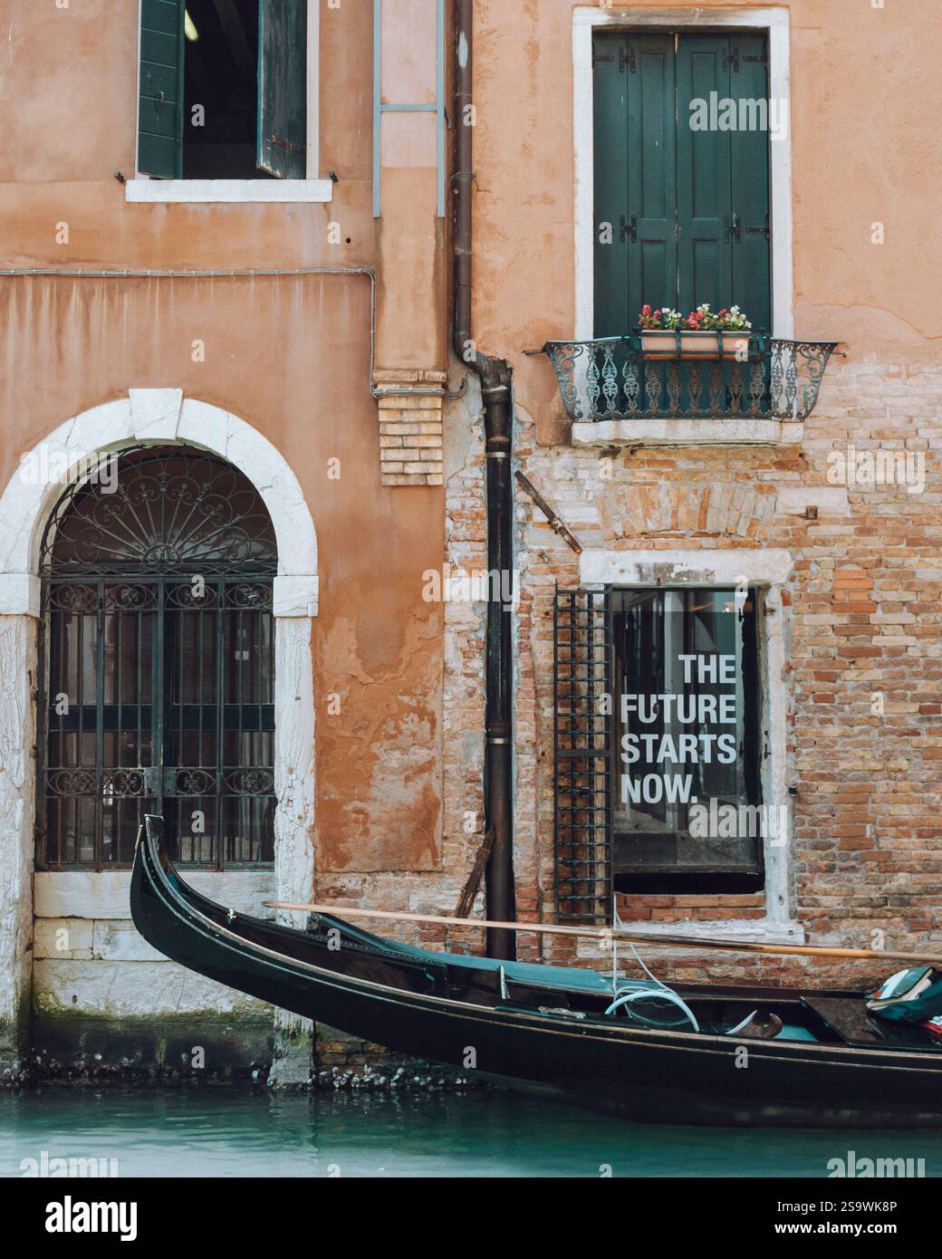 Beautiful photograph of a gondola docked in front of a historic ...