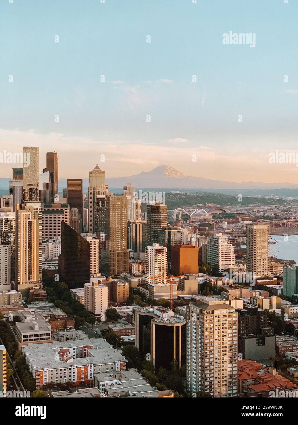 Aerial photograph of the Seattle skyline at sunset, capturing the ...