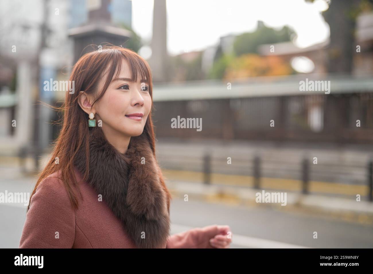 A historic building in Hakata, Fukuoka, Japan. A Japanese woman with ...