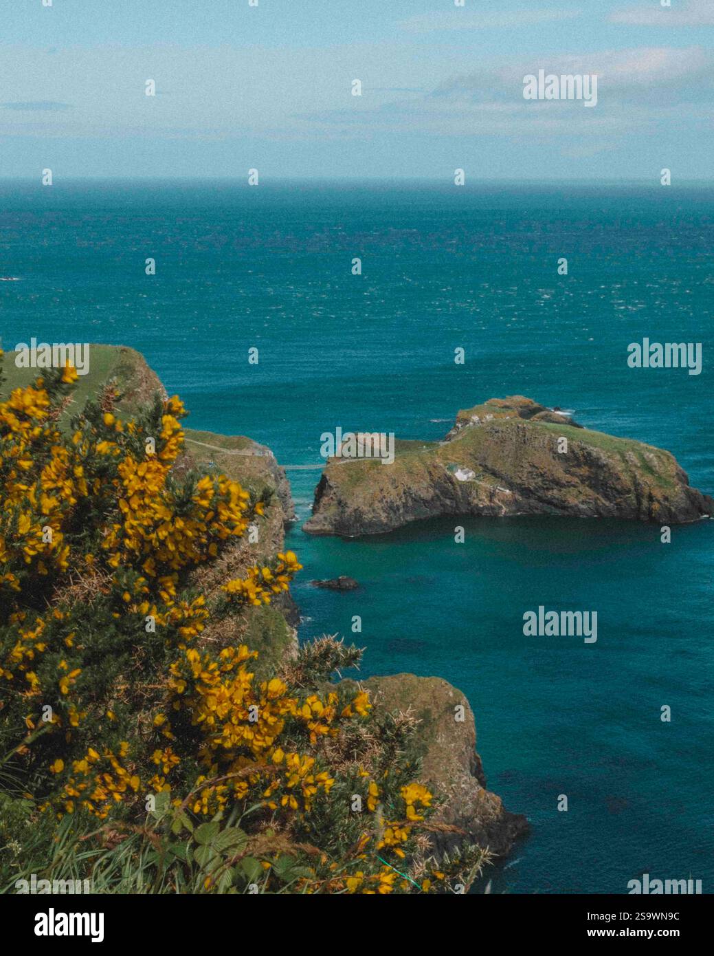 An aerial view of Carrick-a-Rede, a stunning coastal location in ...