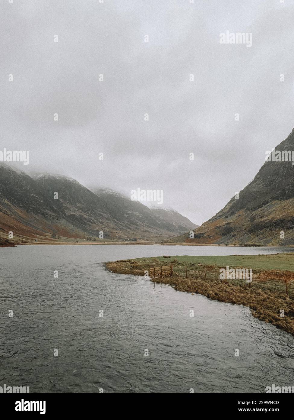 Moody and misty photo of the dramatic Glen Coe mountains in Scotland ...