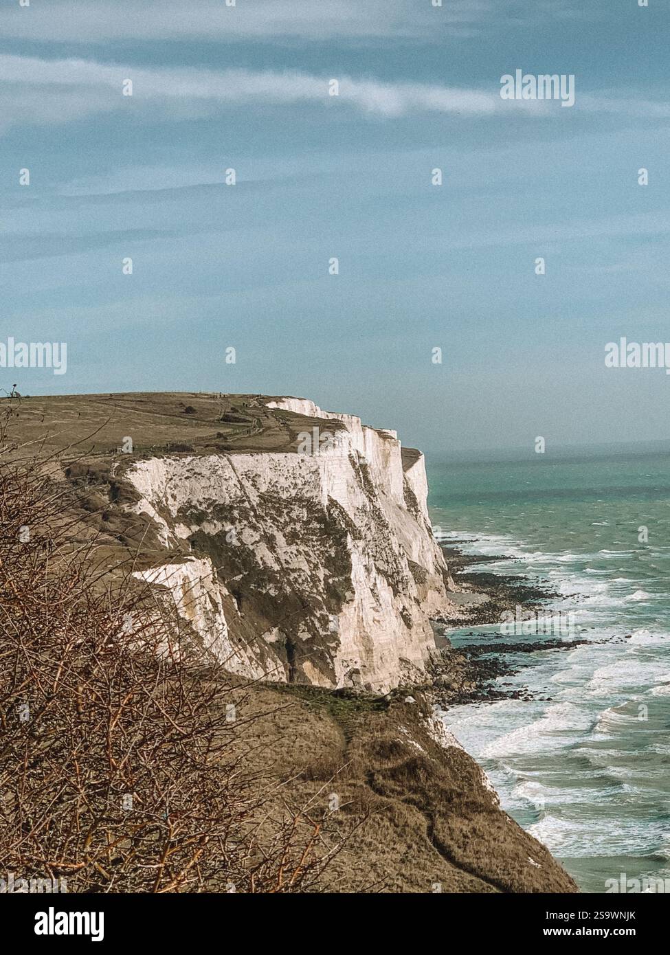Moody photograph of the iconic White Cliffs of Dover, captured under a ...