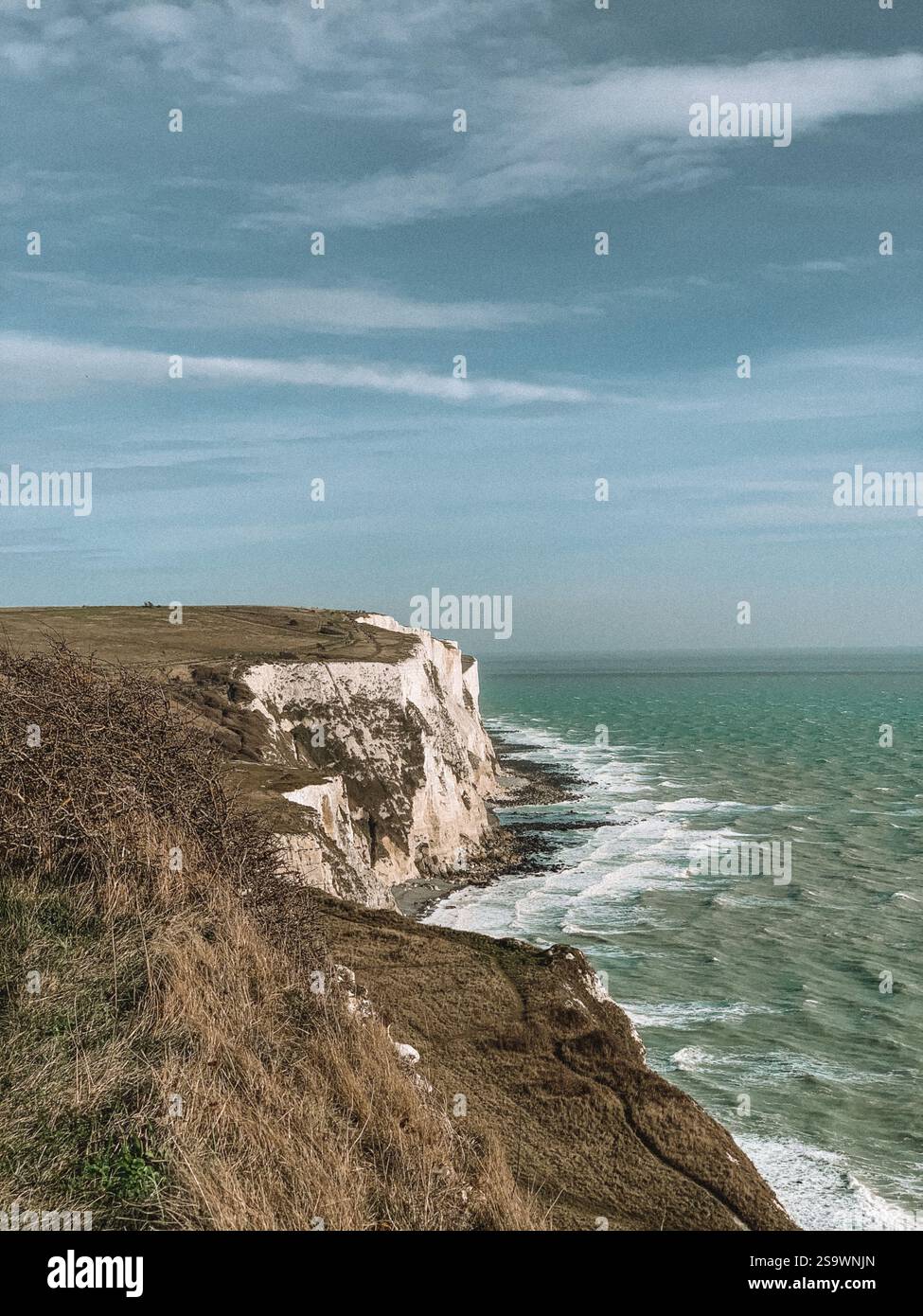 Moody photograph of the iconic White Cliffs of Dover, captured under a ...