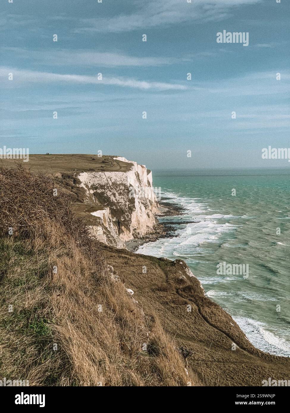 Moody photograph of the iconic White Cliffs of Dover, captured under a ...