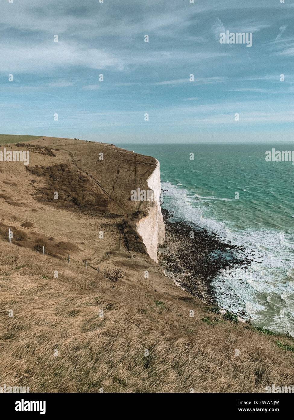 Moody photograph of the iconic White Cliffs of Dover, captured under a ...
