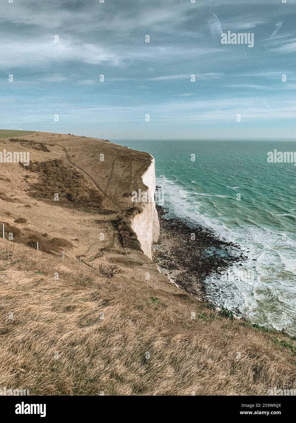 Moody photograph of the iconic White Cliffs of Dover, captured under a ...