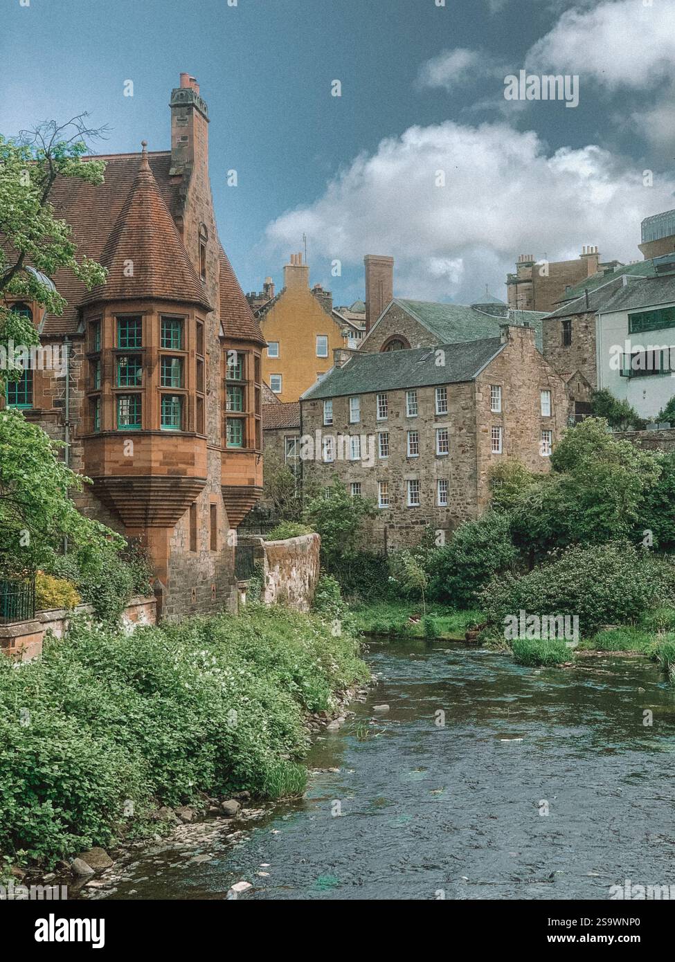 Charming photo of Dean Village in Edinburgh, Scotland, showcasing the ...