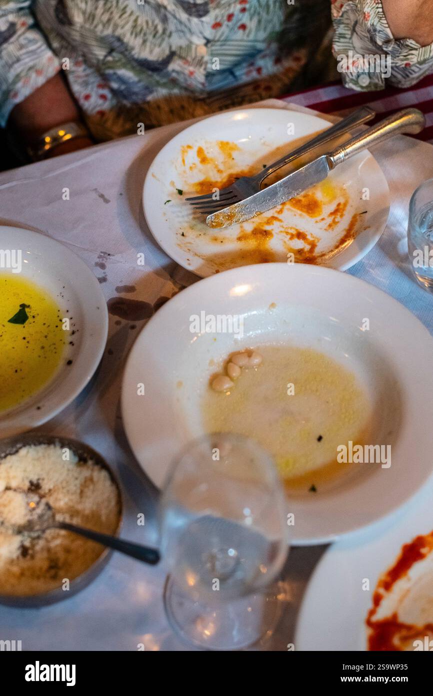 Empty lunch time plates Stock Photo - Alamy