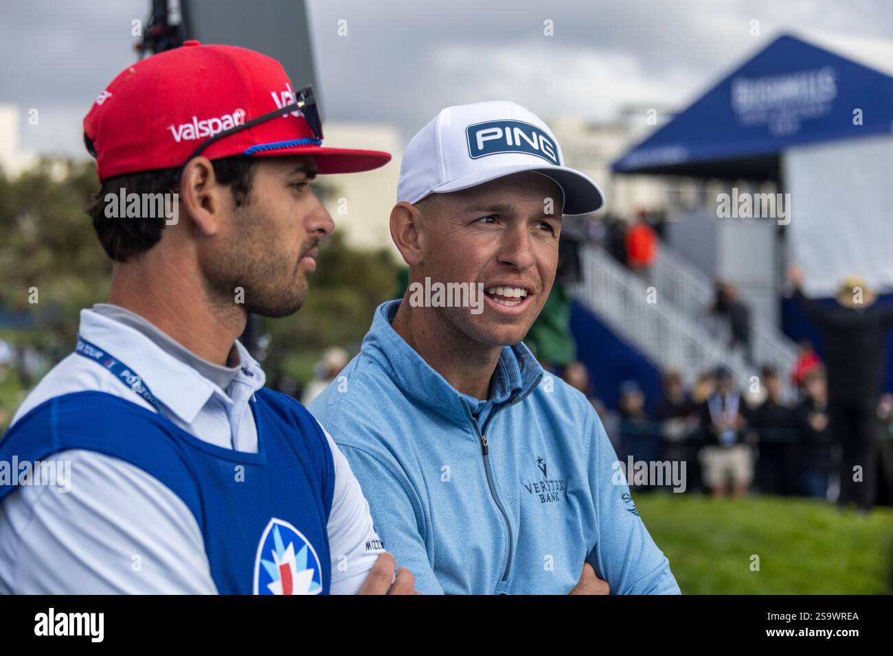 LA JOLLA, CA - JANUARY 25: Sam Stevens talks with his caddie waiting ...