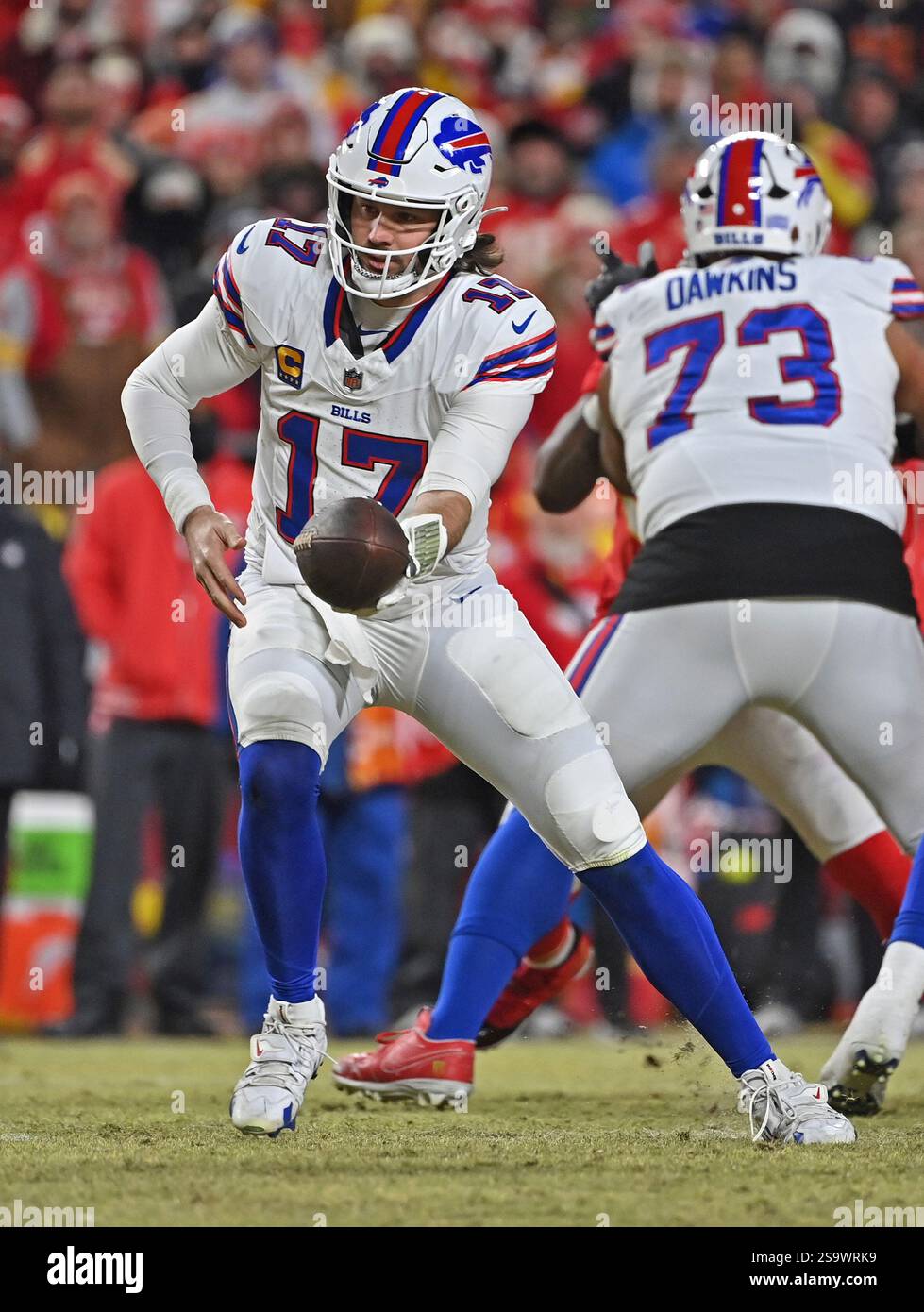 Buffalo Bills quarterback Josh Allen (17) drops back to hand the ball ...