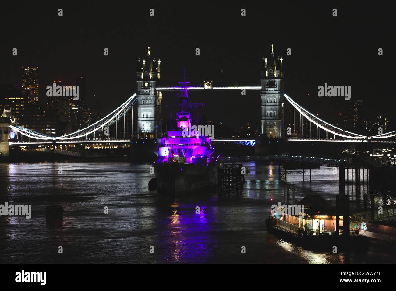 London, UK. 27 January 2025. HMS Belfast was illuminated in purple to ...