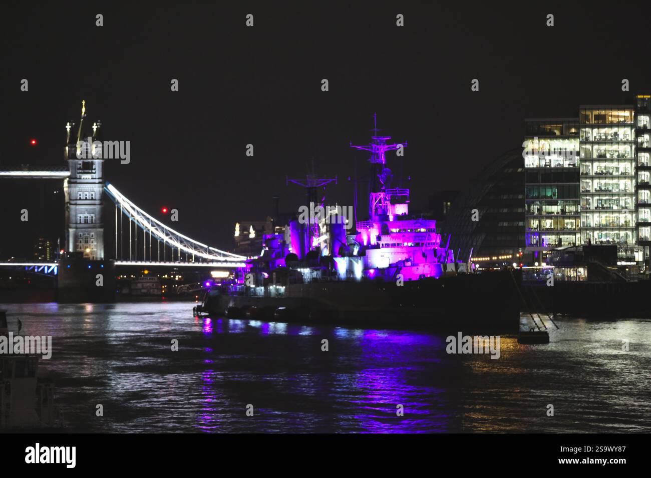 London, UK. 27 January 2025. HMS Belfast was illuminated in purple to ...